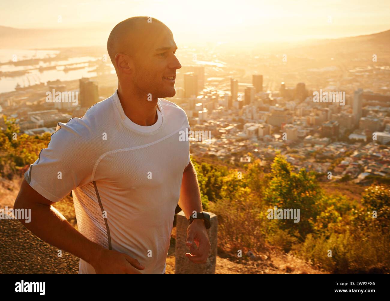 Fitness, running and man at sunset on cliff for health, wellness and ...