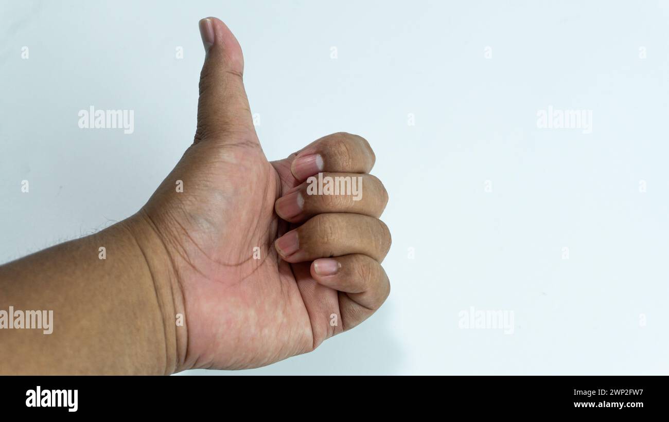 Hand with thumbs up pose, giving OK sign isolated on white background ...