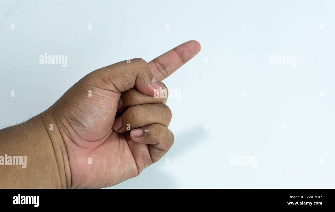 Hand in pointing pose, showing one finger isolated on white background ...