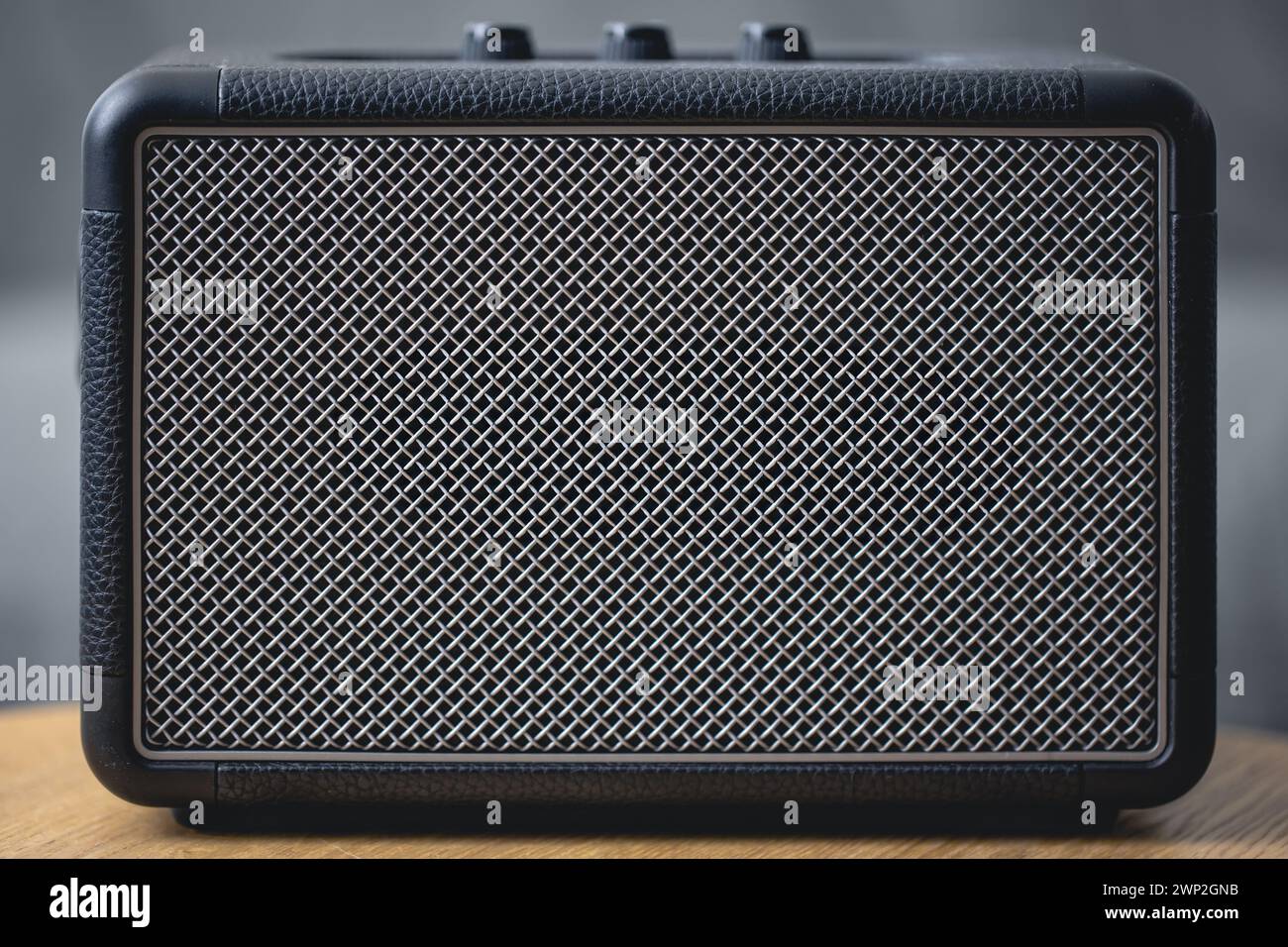 Square music speaker, metallic mesh texture close-up Stock Photo - Alamy
