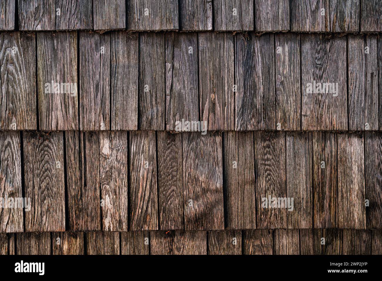 Texture of worn wooden roof tile pattern, detail of a typical old ...