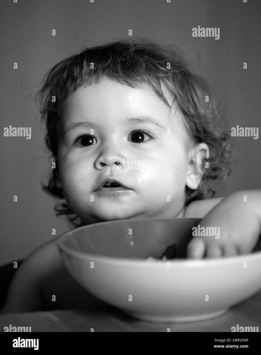 Happy kids eating tasty Black and White Stock Photos & Images - Alamy