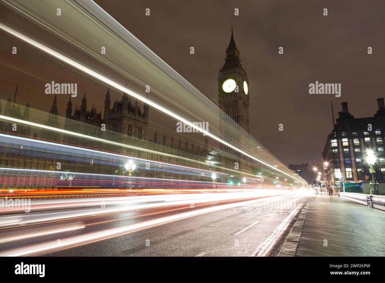 UK, London, Westminster bridge and Big Ben with trails of traffic at ...