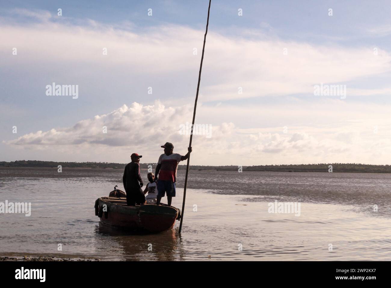 Boat with people, silhouettes of people inside a rustic wooden boat, on ...