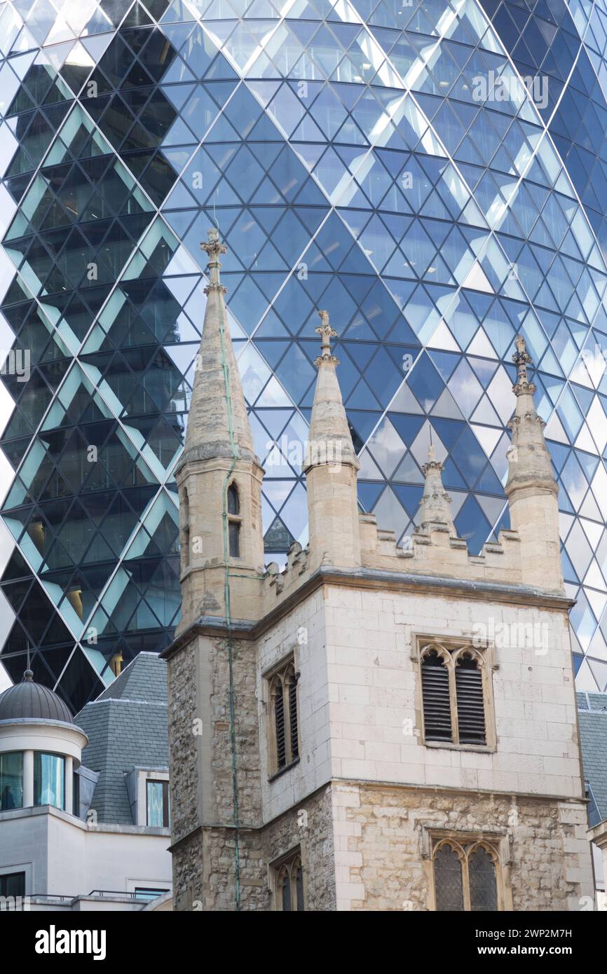 UK, London, the Gherkin reflecting St Andrew Undershaft church, St Mary ...