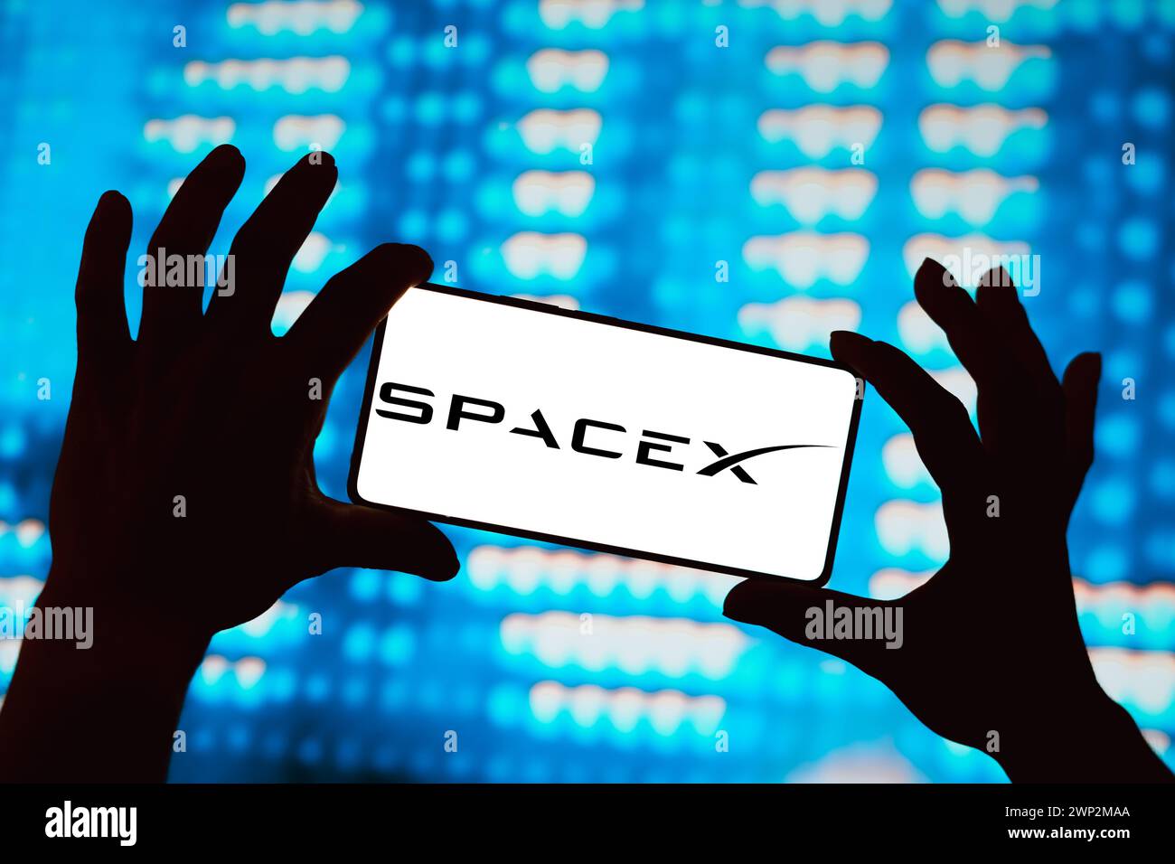 In this photo illustration, the Space Exploration Technologies Corp. (SpaceX) logo is displayed ...