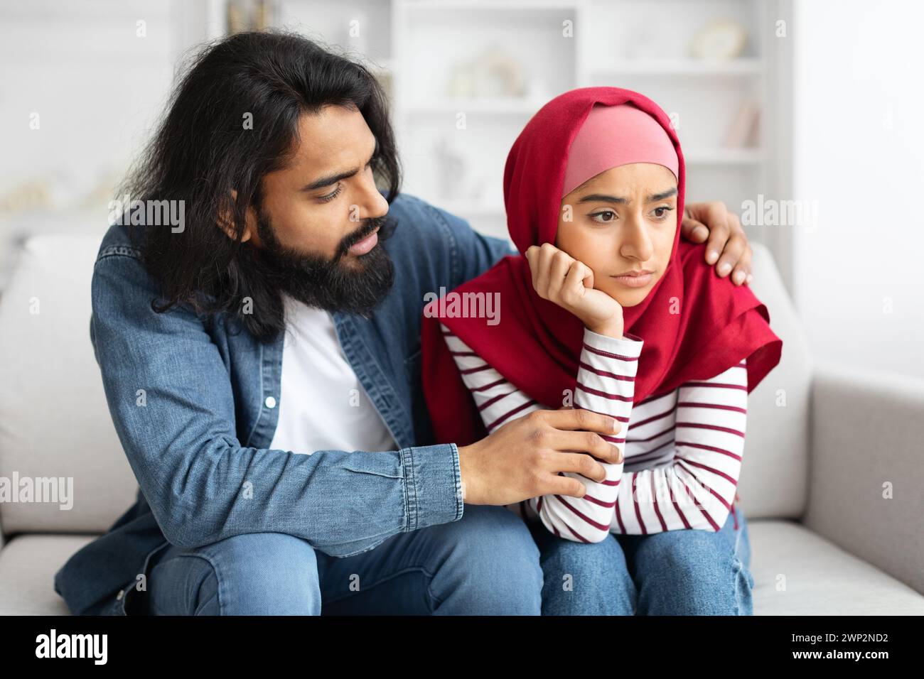 Caring Arab Man Comforting His Upset Muslim Wife At Home Stock Photo ...