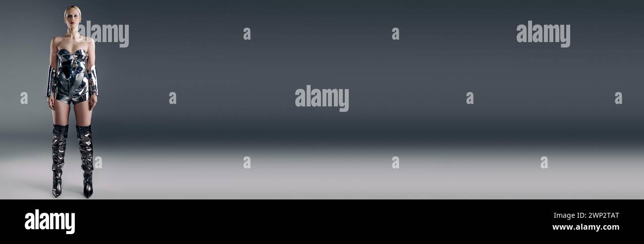 futuristic peculiar woman in metallic attire looking straight at camera ...