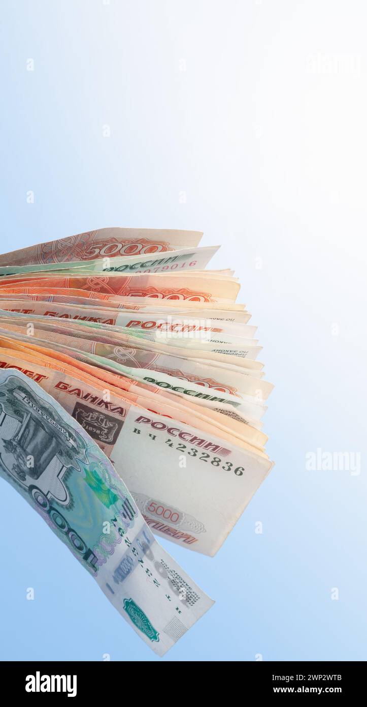 Paper money spread out in a fan in denominations of one thousand and ...