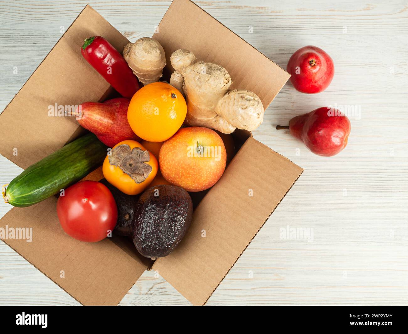 Delivery of fruits and vegetables in a corton box, the box is open ...