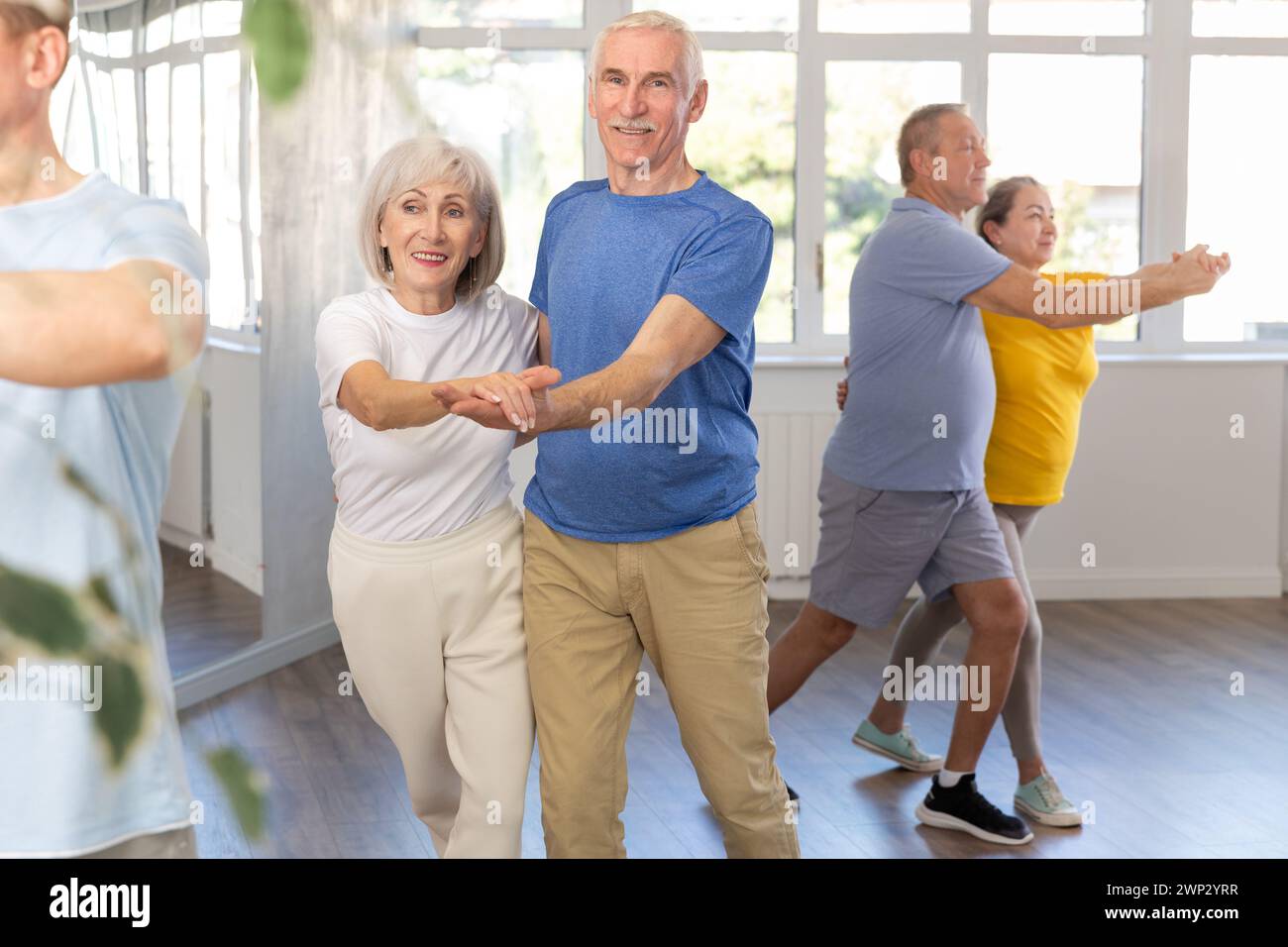 Woman aged 65 dancing hi-res stock photography and images - Alamy