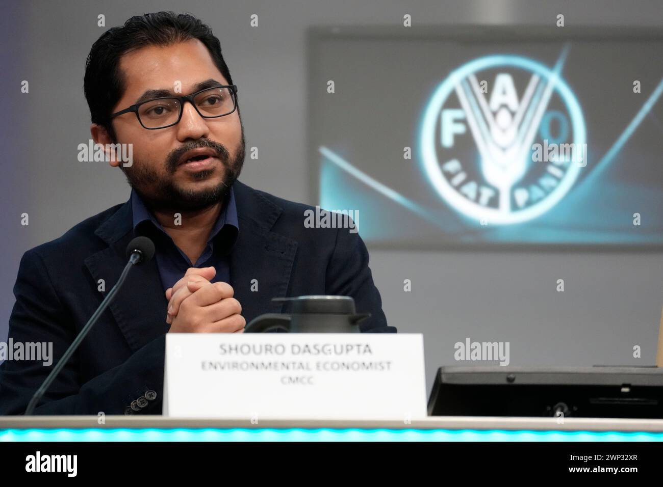 Environmental economist Shore Dasgupta delivers his speech during the ...