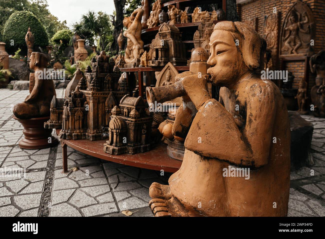 Ceramic figures on the street in Vietnam Stock Photo - Alamy