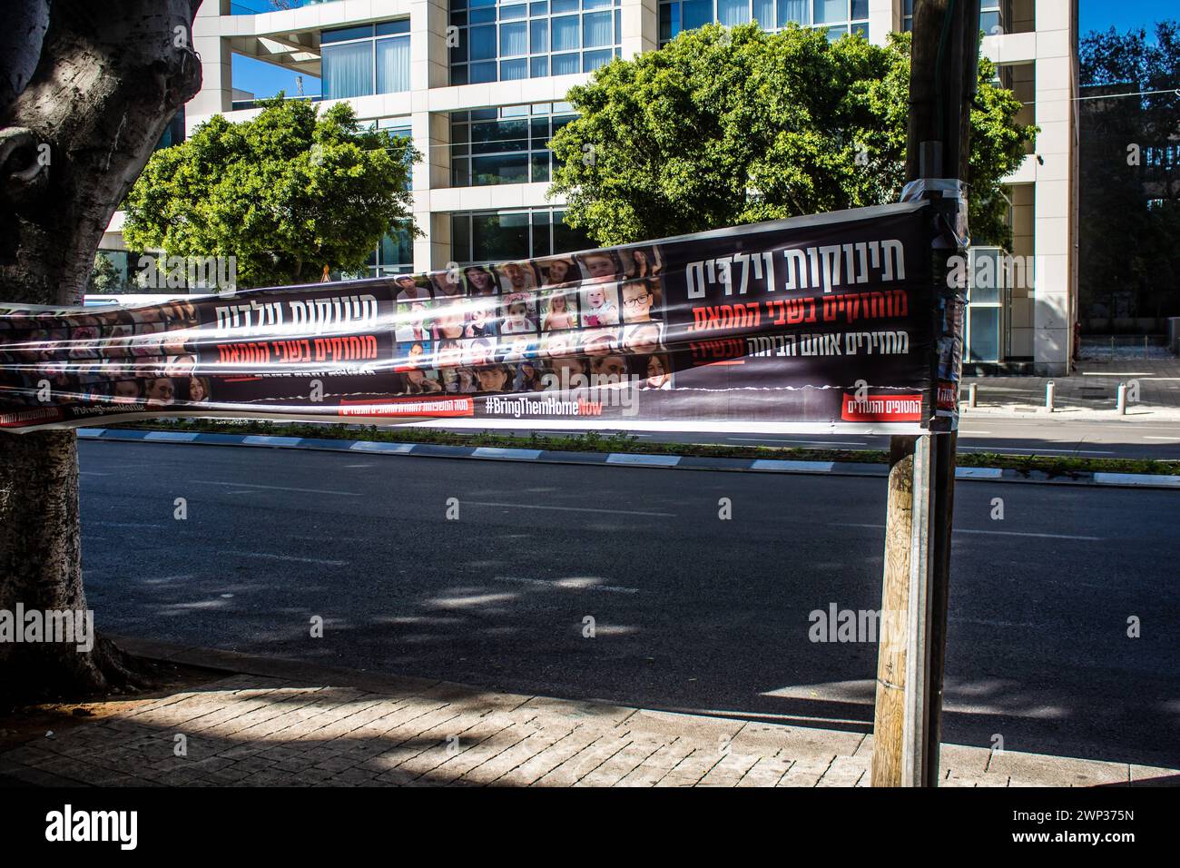 Tel Aviv, Israel, March 4, 2024 Posters depicting the faces of hostages ...