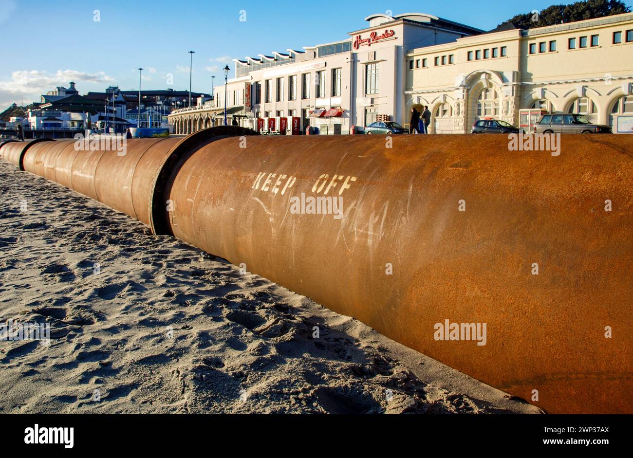 Pipework on a beach Stock Photo - Alamy