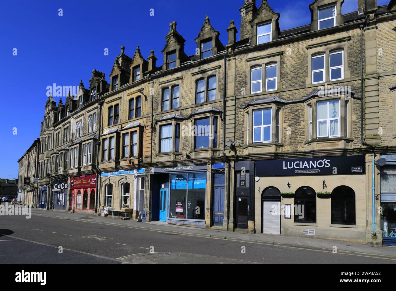 Shops in the high street of the town of Buxton, Peak District National ...
