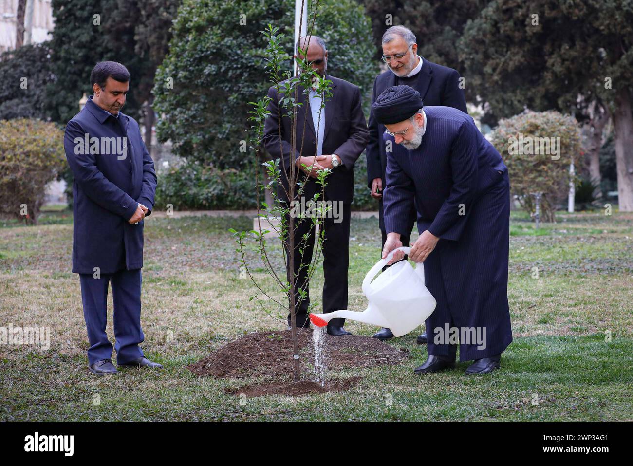 Tehran, Iran. 5th Mar, 2024. Iranian President EBRAHIM RAISI watering a ...
