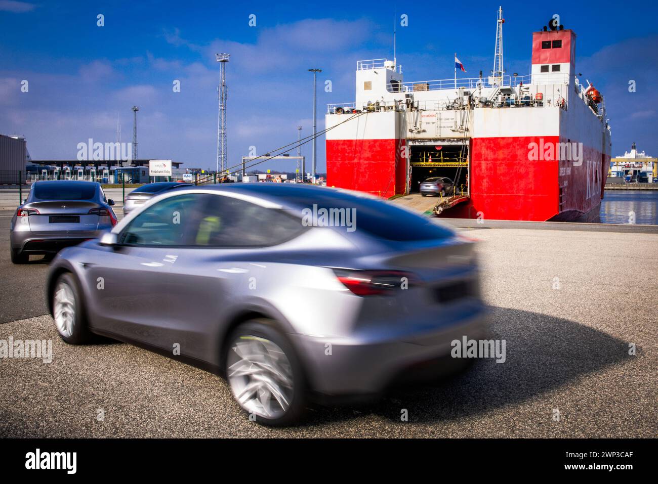 Rostock, Germany. 28th Feb, 2024. Brand-new Tesla electric cars are ...