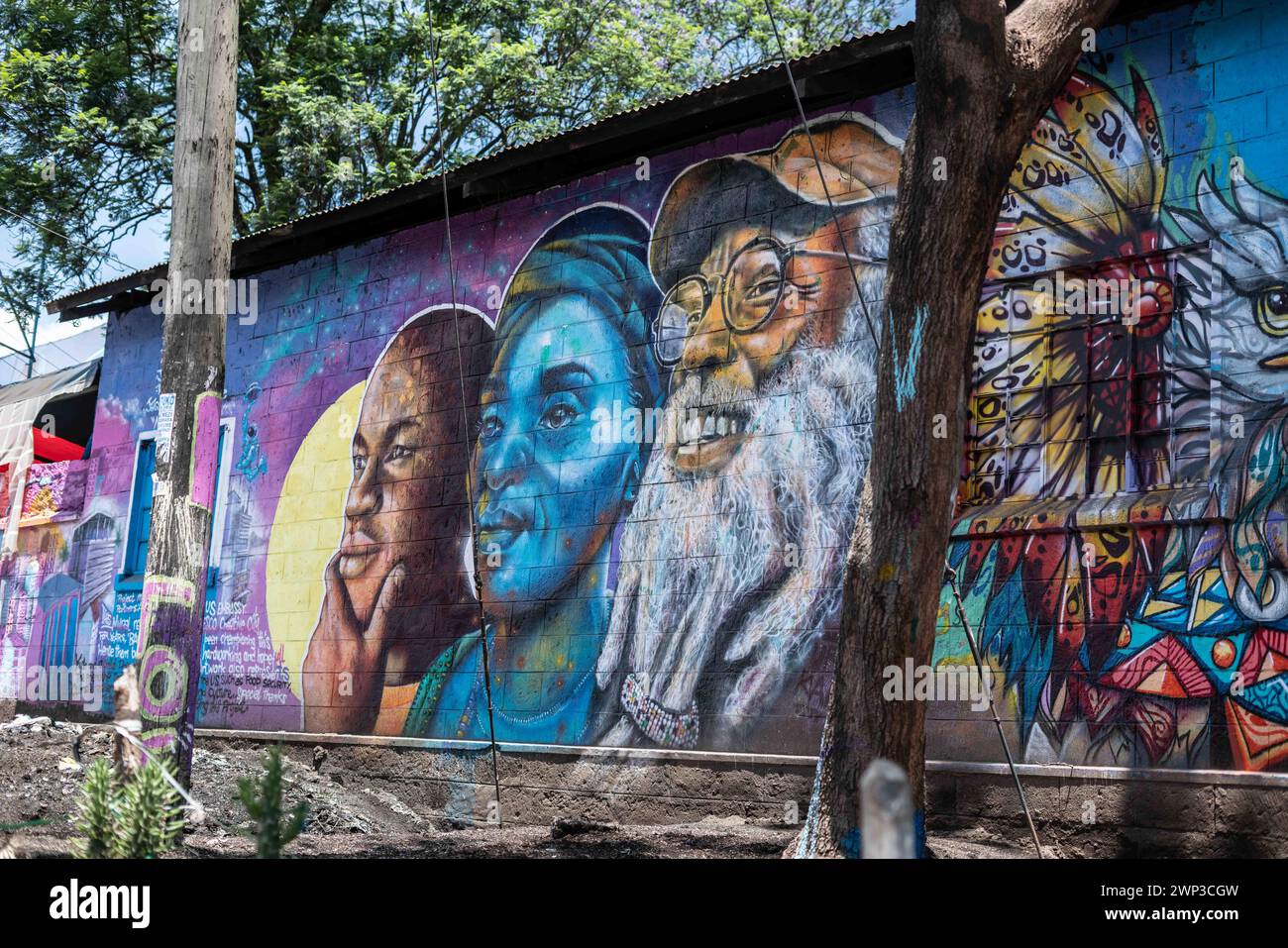 A mural depicting faces of people is seen painted on a wall in Nakuru ...