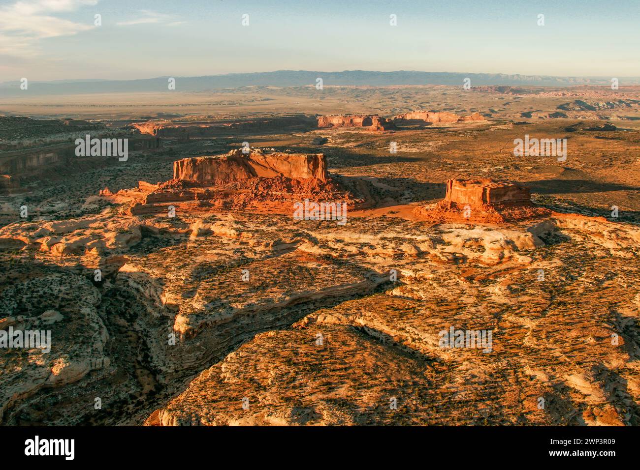 Aerial view of the Merrimac & Monitor Buttes at sunset near Moab, Utah ...