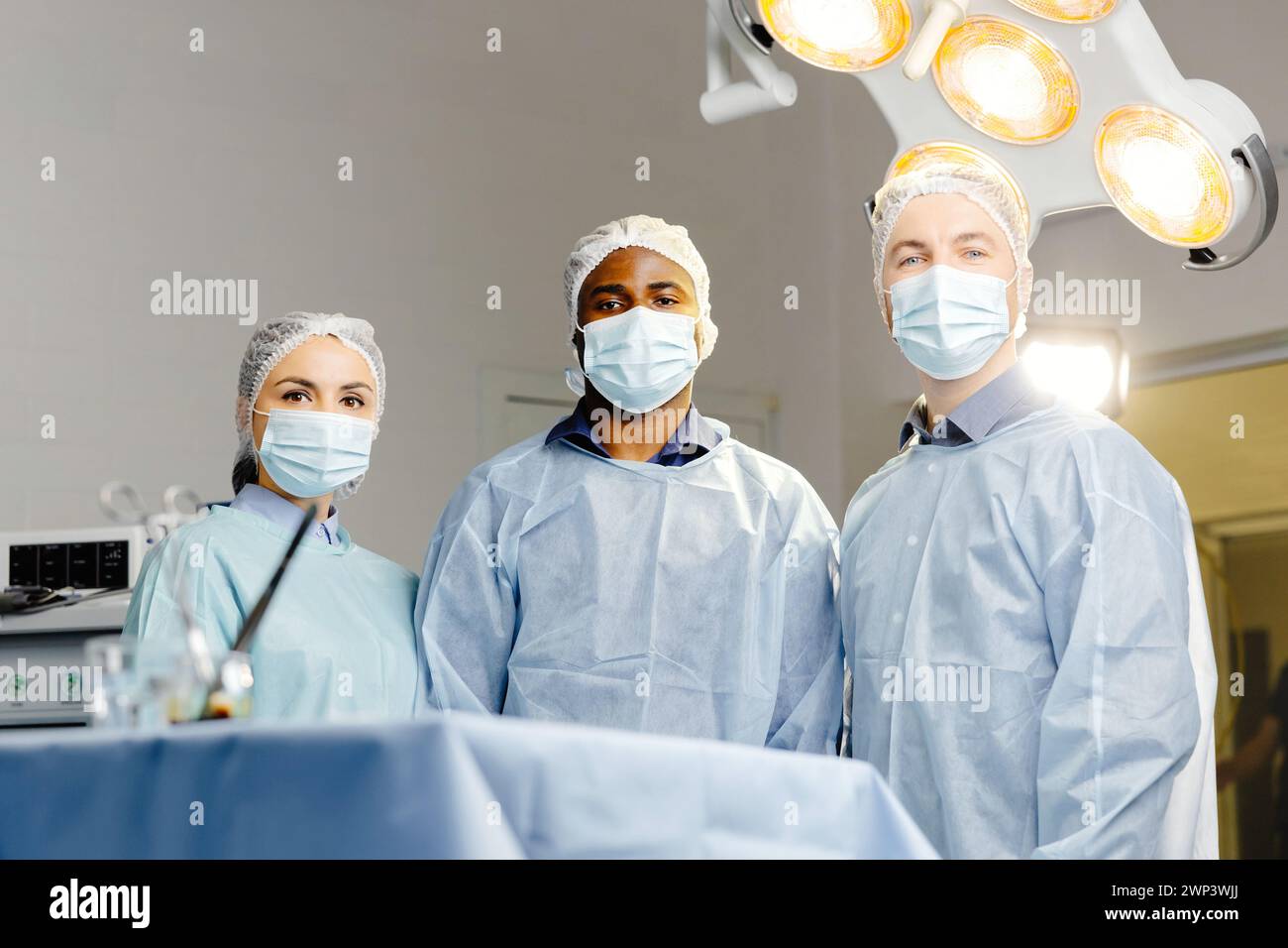 Group of doctors standing together Stock Photo - Alamy