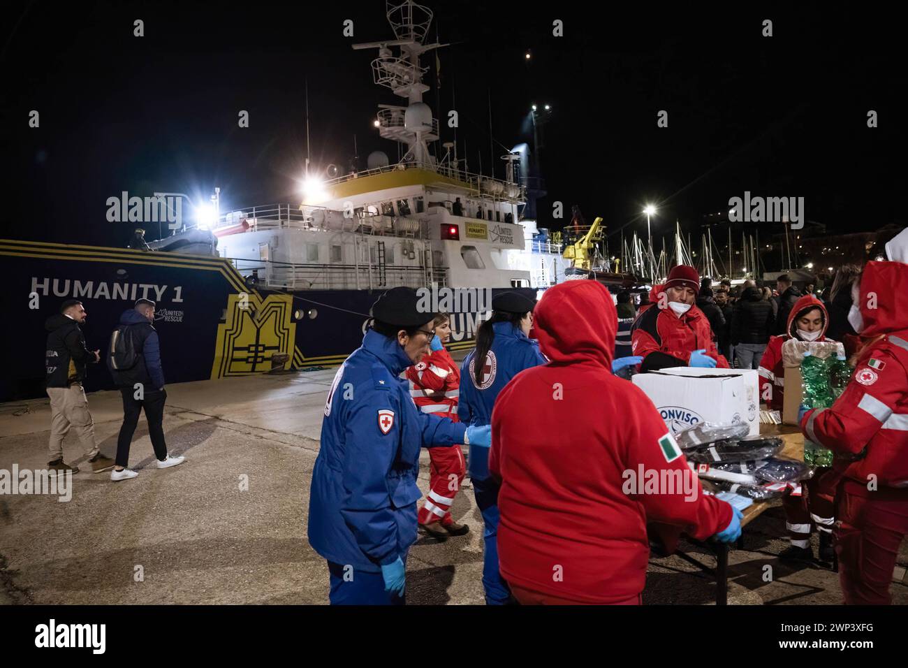 People from the Red Cross seen at the port. The rescue ship Humanity 1 ...