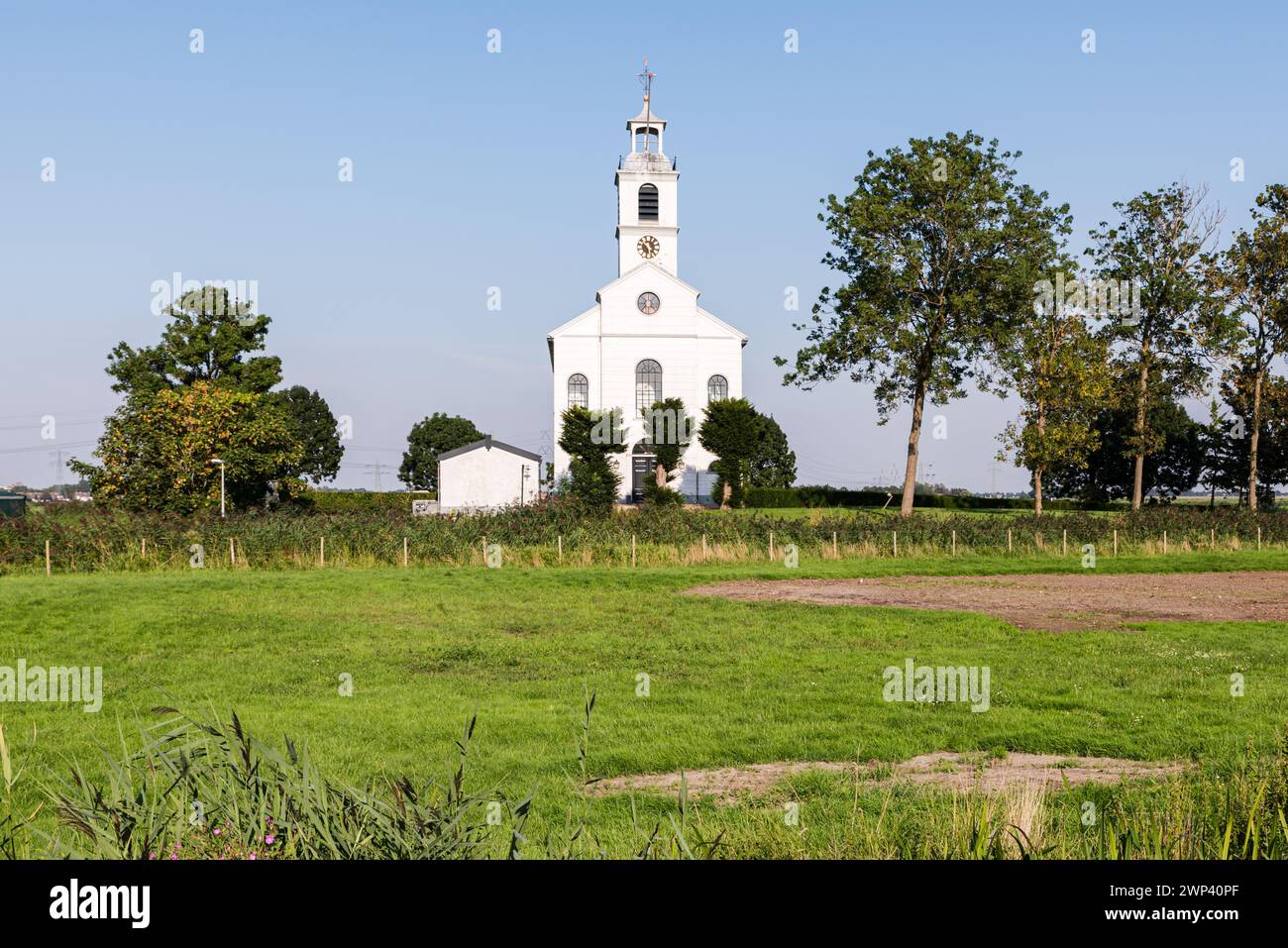 The little white church of Simonshaven on Voorne-Putten in the ...