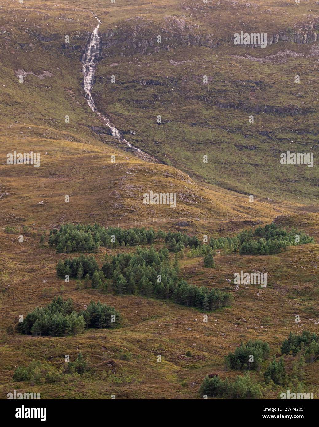 Waterfall after heavy rain down a hillside in Scottish highlands Stock ...