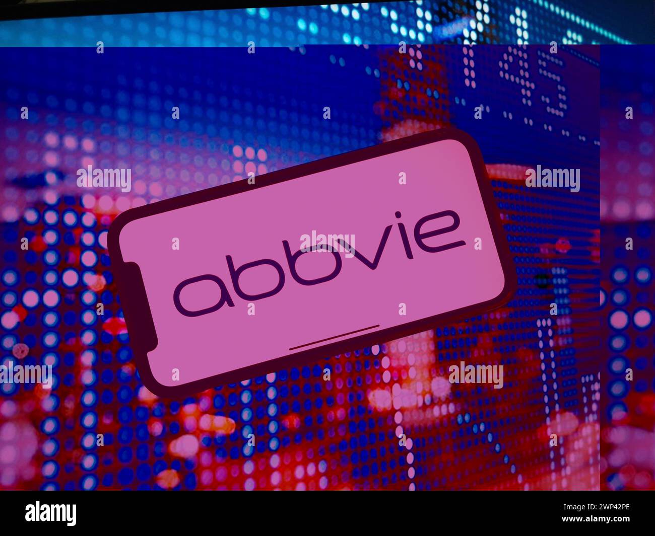 In this photo illustration, the AbbVie company logo is seen displayed ...