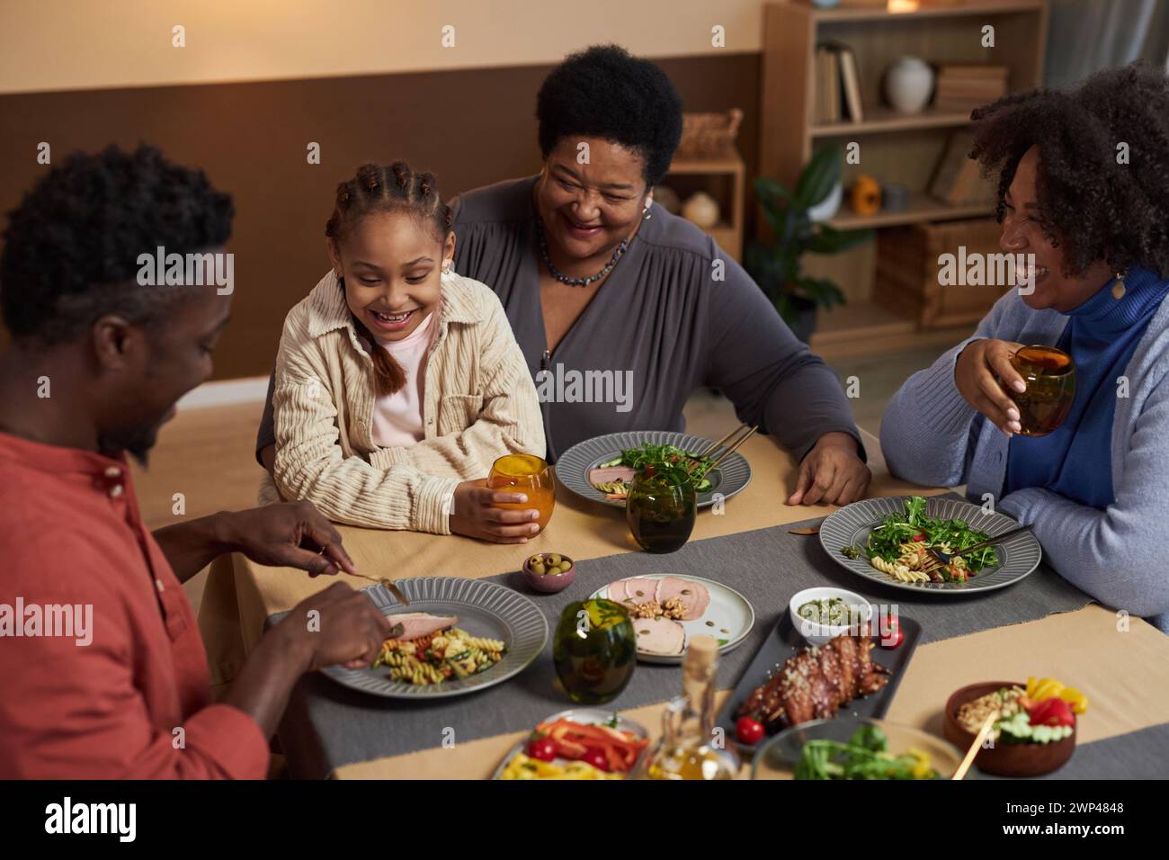 High angle view at smiling African American senior woman enjoying ...