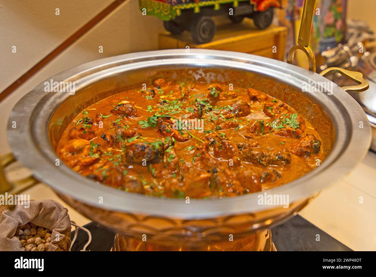 butter chicken curry in a buffet Stock Photo - Alamy