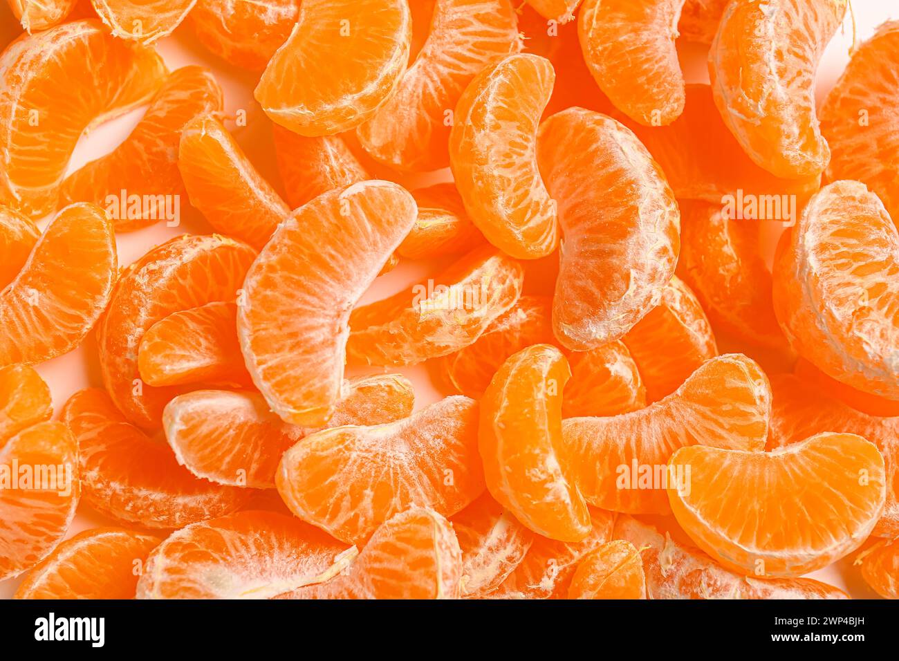 Texture of sweet peeled mandarins as background Stock Photo - Alamy
