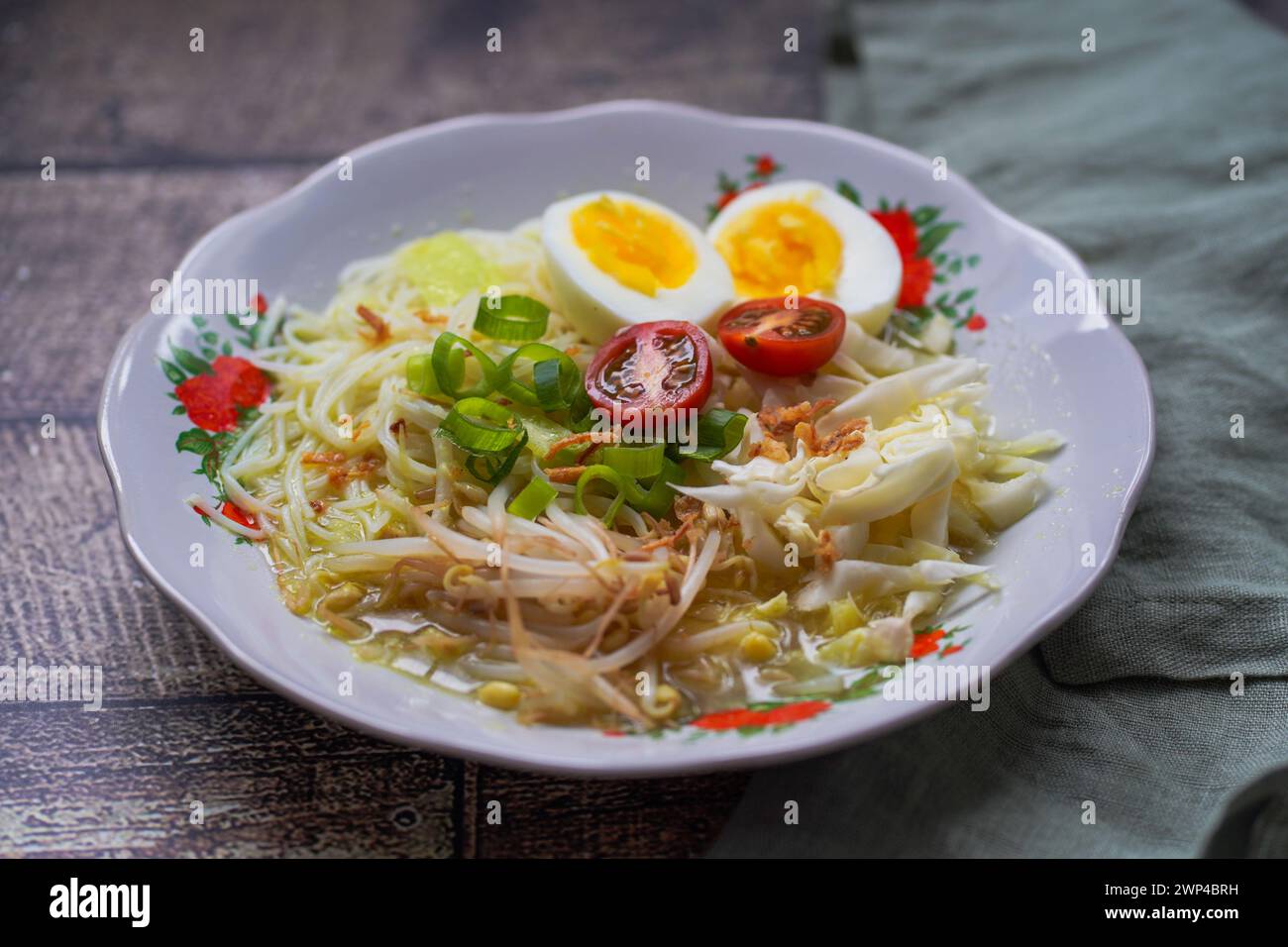 Soto ayam is a traditional Indonesian soup mainly composed of broth ...