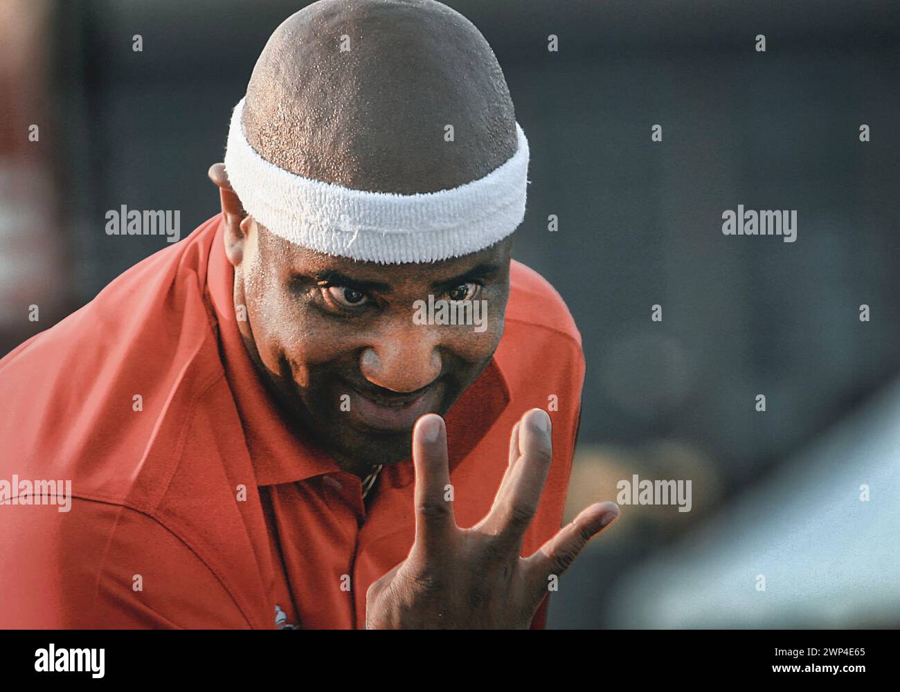 A strange figure making a hand gesture Stock Photo - Alamy