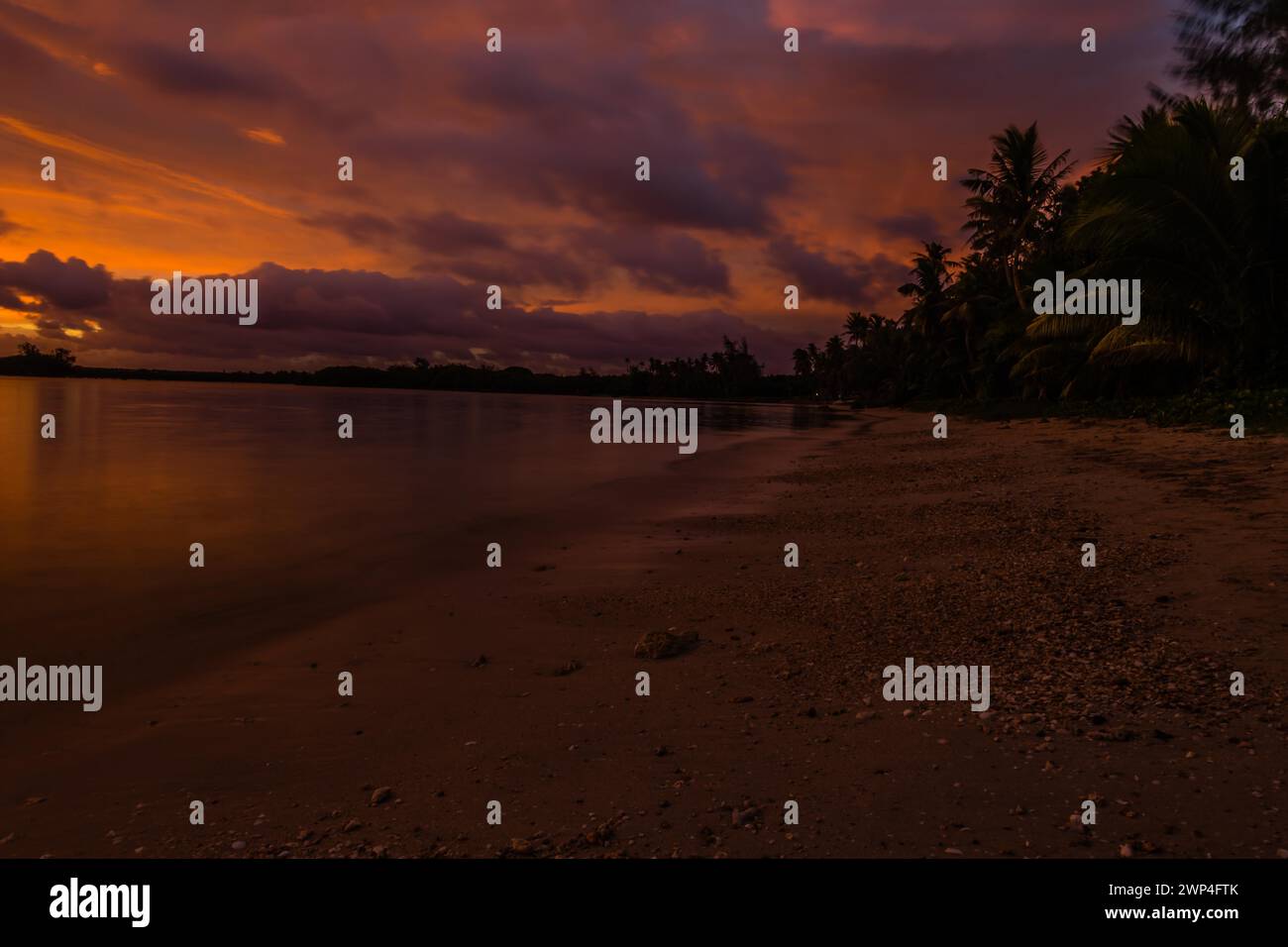 Beautiful sunset over ocean water taken from a beach in Guam Stock ...