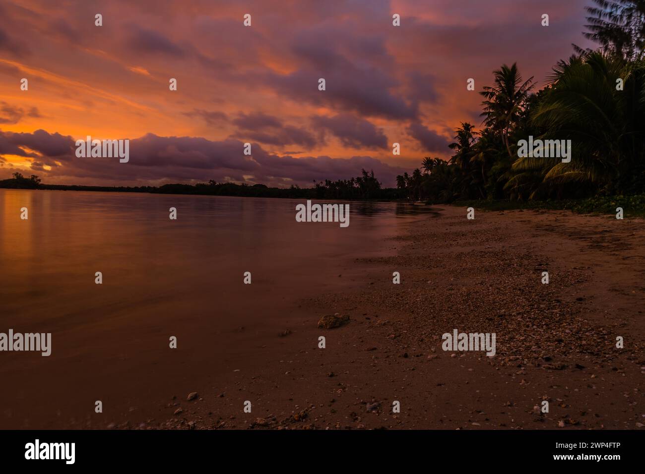Beautiful sunset over ocean water taken from a beach in Guam Stock ...