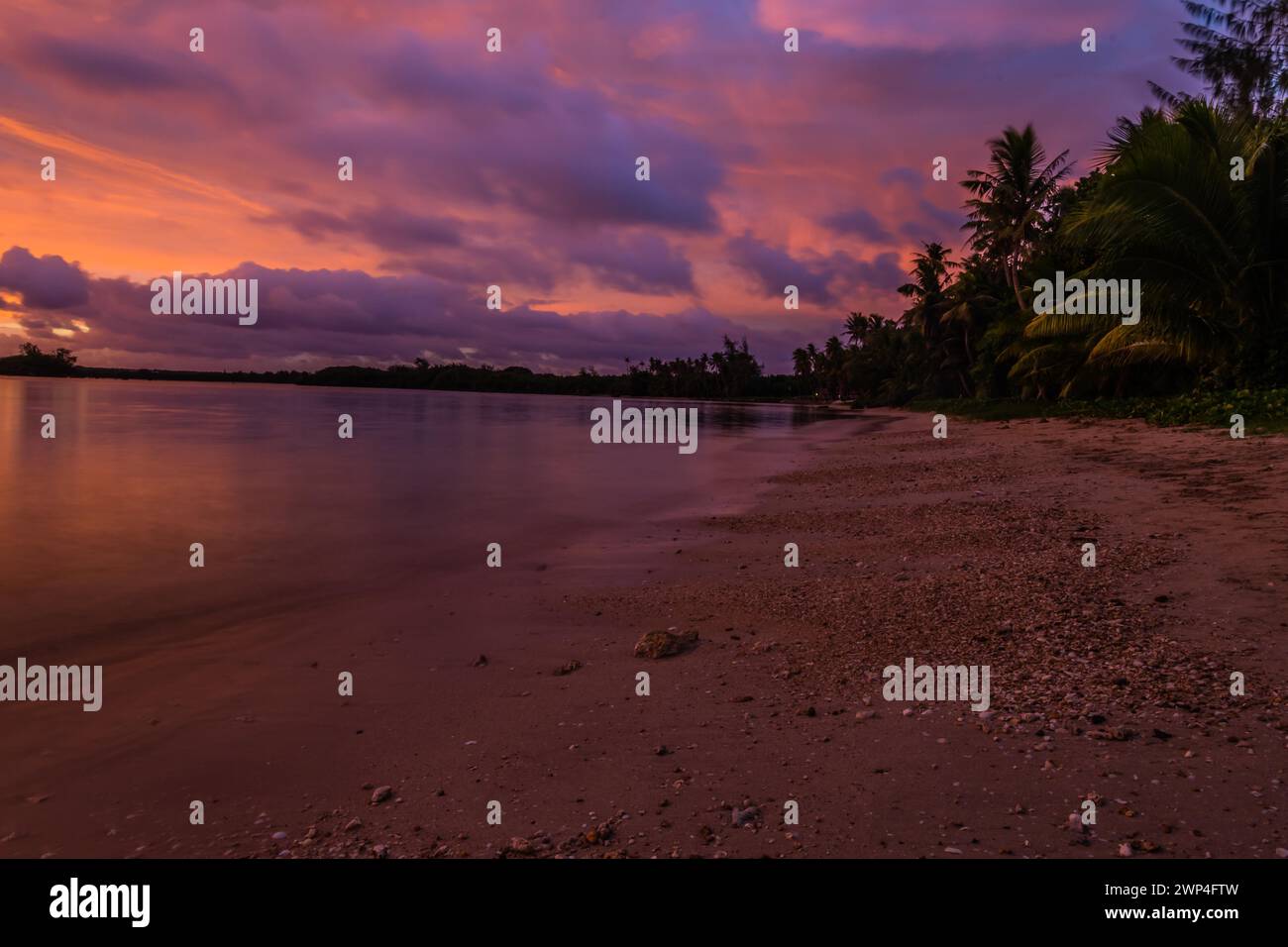 Beautiful sunset over ocean water taken from a beach in Guam Stock ...