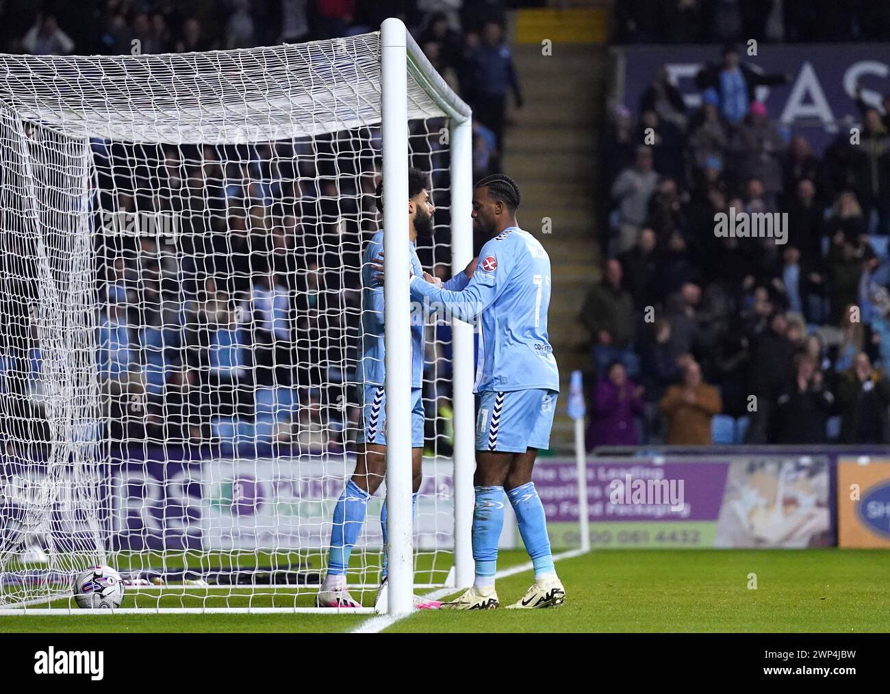 Coventry City's Ellis Simms (left) celebrates scoring their side's ...