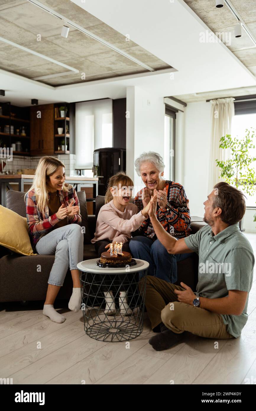 Family bonding moment unfolds hi-res stock photography and images - Alamy