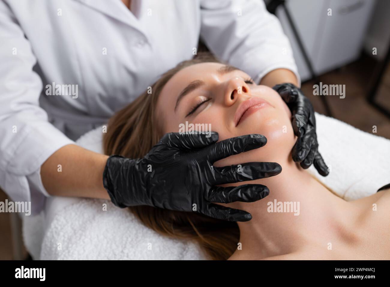 Beautiful woman getting face hi-res stock photography and images - Alamy