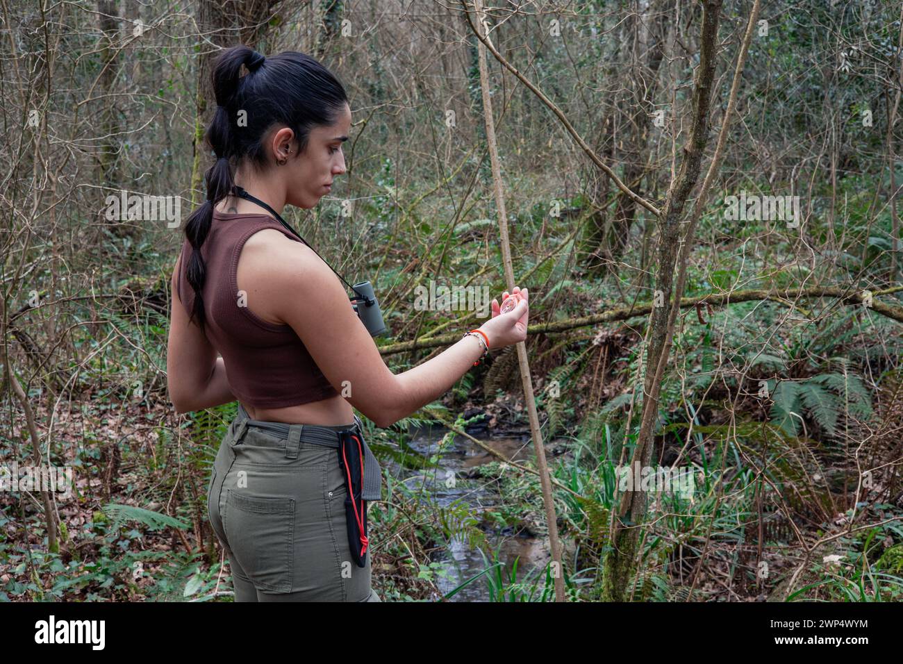 "In this striking scene, a captivating young girl explorer, exuding ...