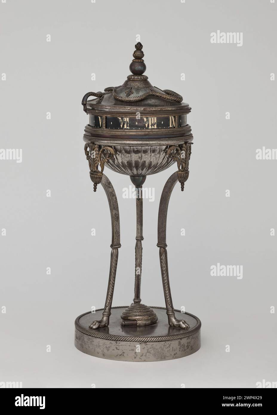 Tri-headed rotation clock created around 1823 by Tasha, featuring three ...