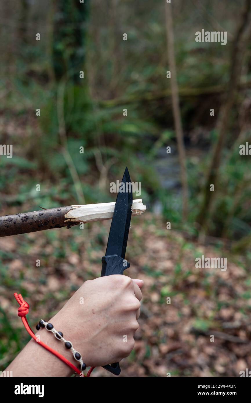 Crafting a spear hi-res stock photography and images - Alamy