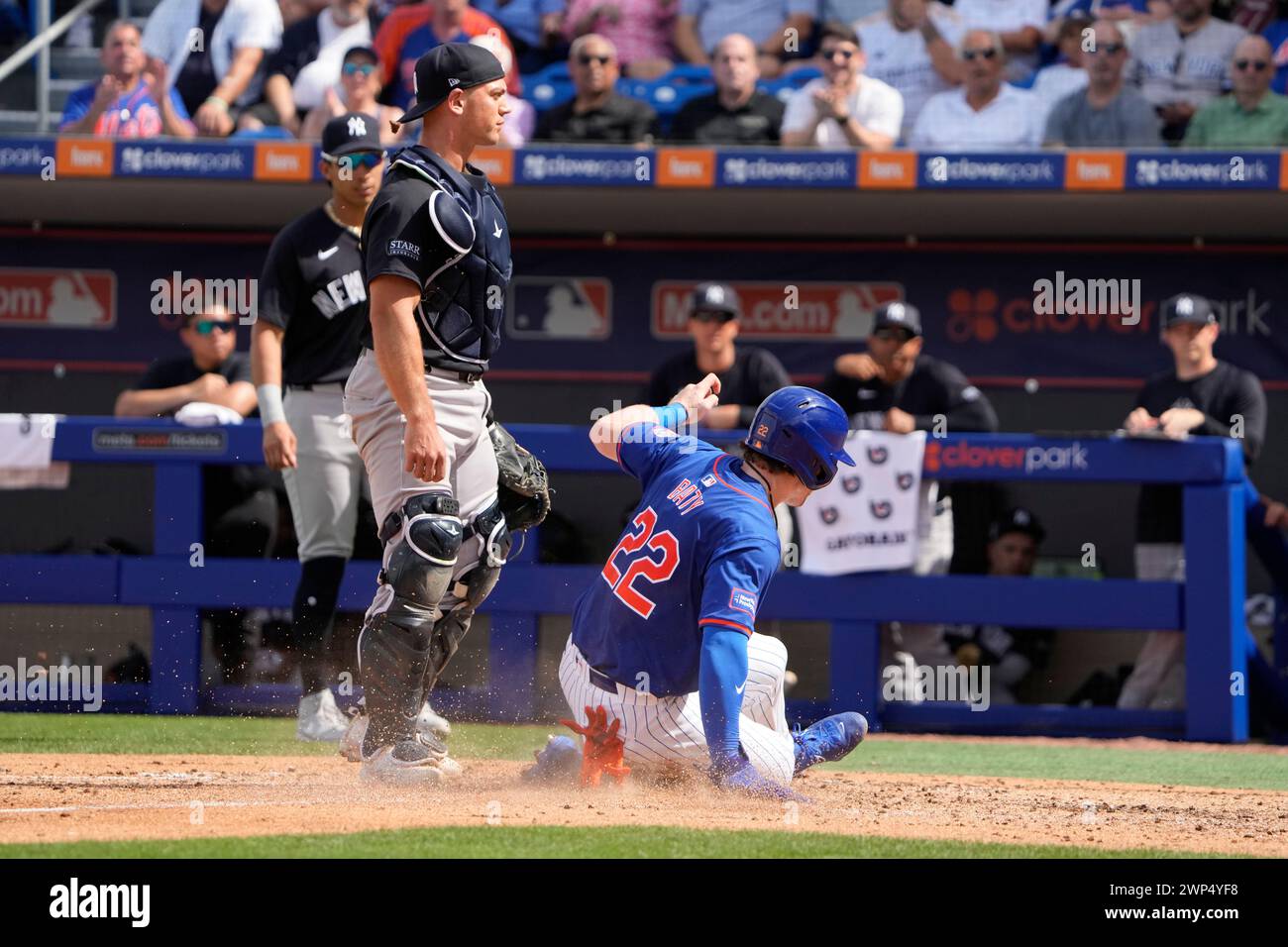 New York Mets' Brett Baty (22) scores past New York Yankees catcher Ben ...