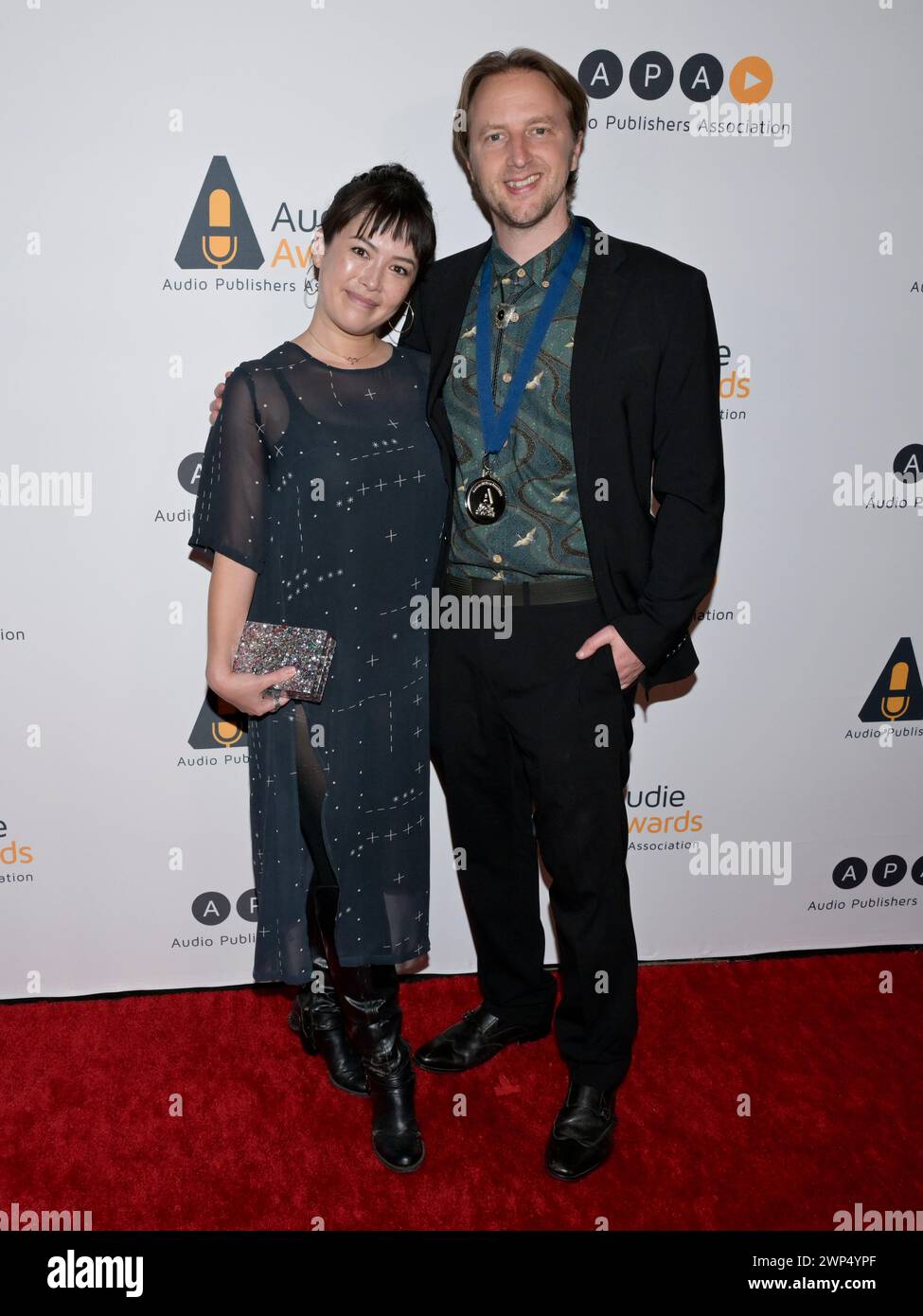 March 4, 2024, Hollywood, California, U.S.: Andrew Eiden and wife Sarah attend the 2024 Audie ...