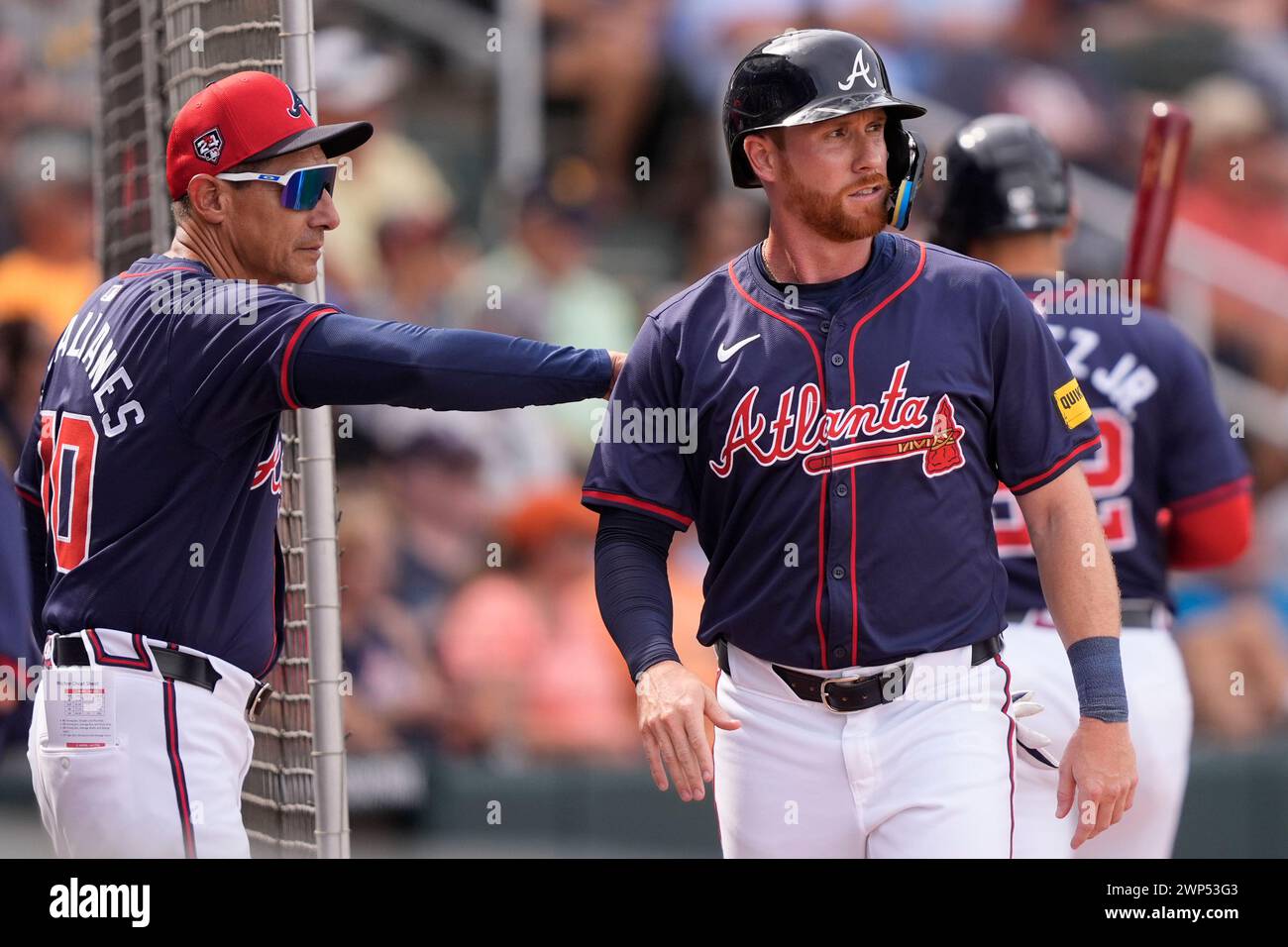 Atlanta Braves Jordan Luplow, right, is greeted by assistant hitting ...