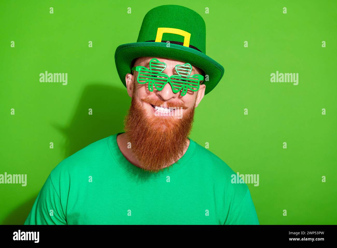 Portrait of cheerful charismatic person toothy smile clover symbol ...
