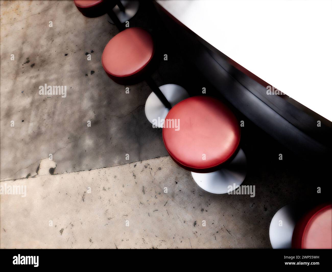 Red Stools near Bar abstract Stock Photo - Alamy