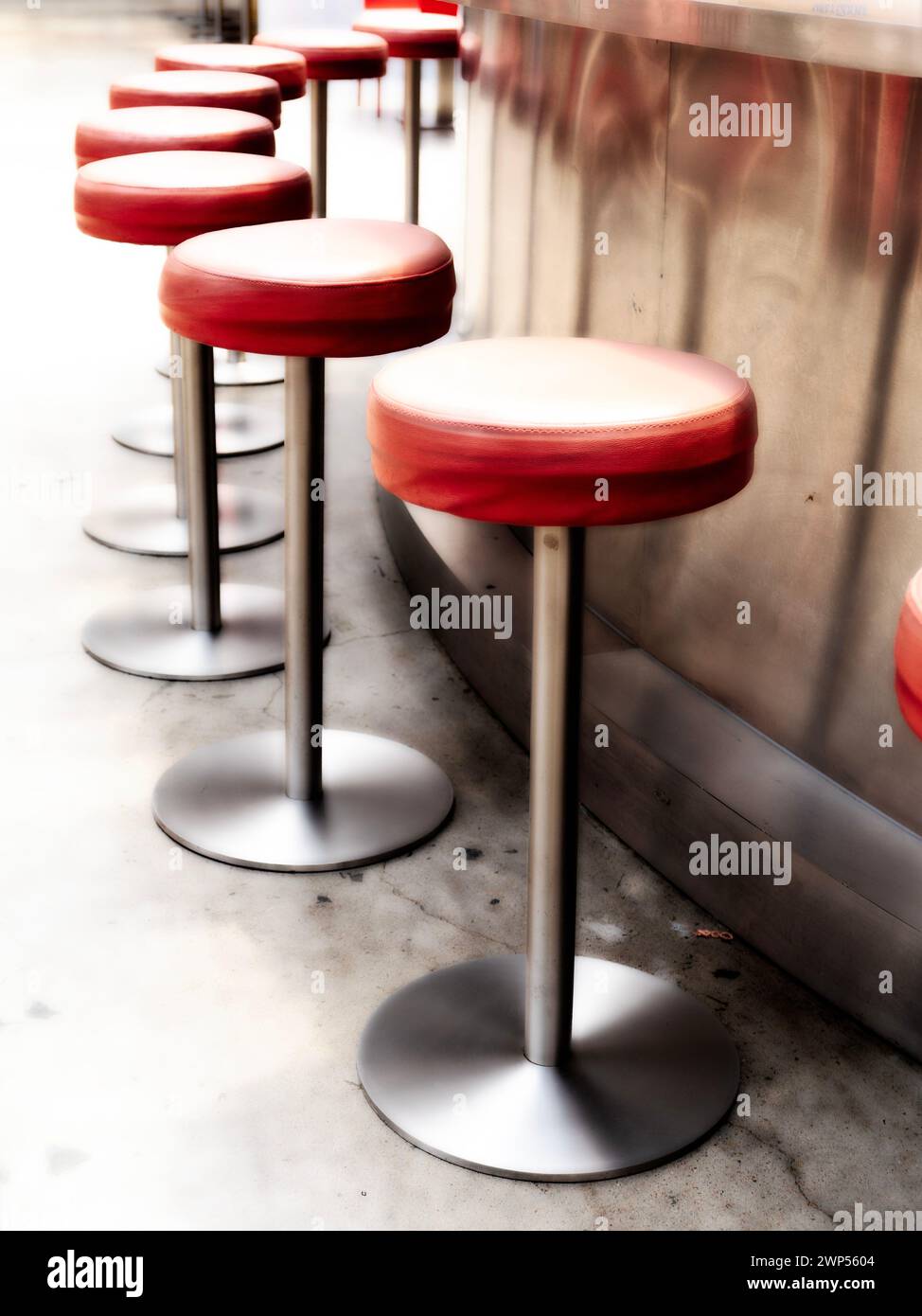 Red Stools near Bar abstract Stock Photo - Alamy