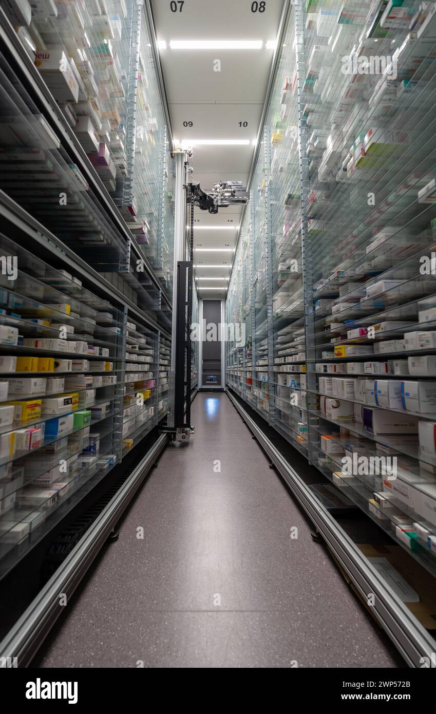Photography of a pharmacy storage room and a robot hand are arranging ...